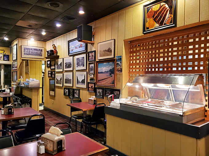 The photo gallery wall – a visual history of Salina's love affair with properly smoked meat and the people who make it happen. 