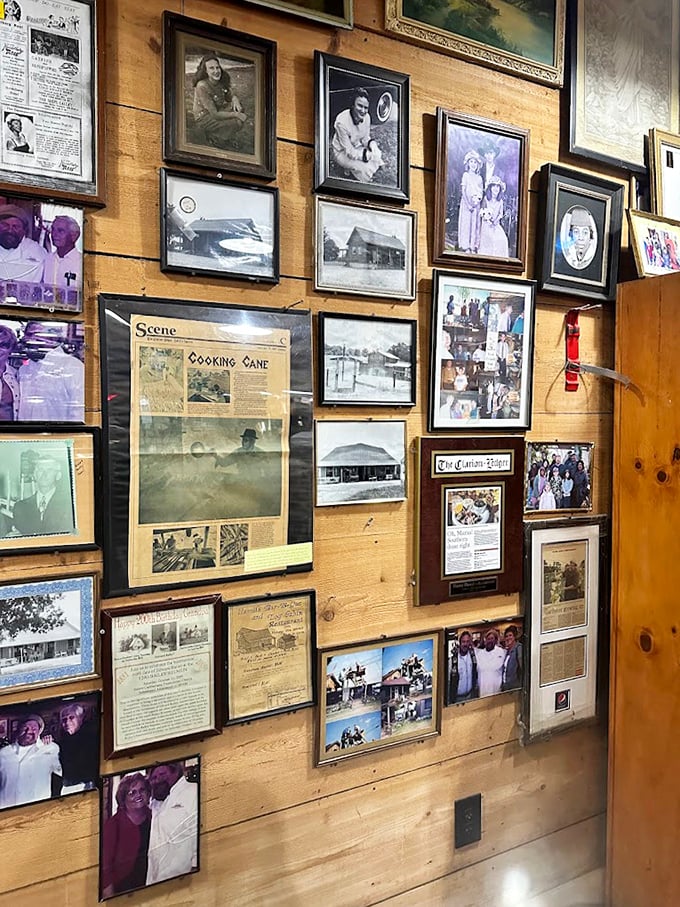 The wall of memories showcases generations of Southern tradition, each frame a testament to food's power to bring people together.