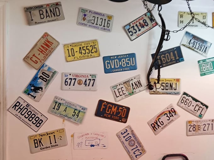 License plates from across America adorn the walls—silent testimonials from travelers who found their way to this Florida culinary crossroads.