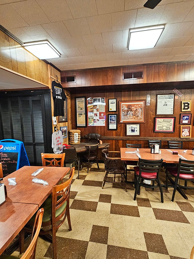 Wood paneling, checkered floors, and walls covered in memories—the dining room feels like Arkansas's living room, where everyone's welcome.
