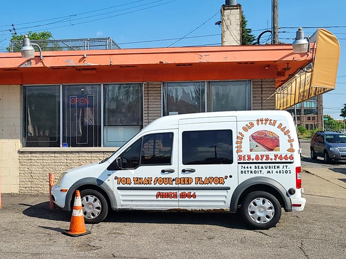The delivery vehicle proudly proclaims "For That Soul-Fed Flavor" – because in Detroit, good barbecue isn't just food, it's spiritual nourishment.