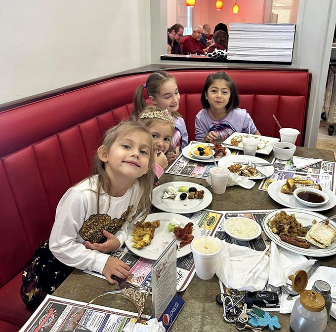 Family breakfast outings: where memories are made, pancakes are negotiated, and at least one child is guaranteed to spill something.