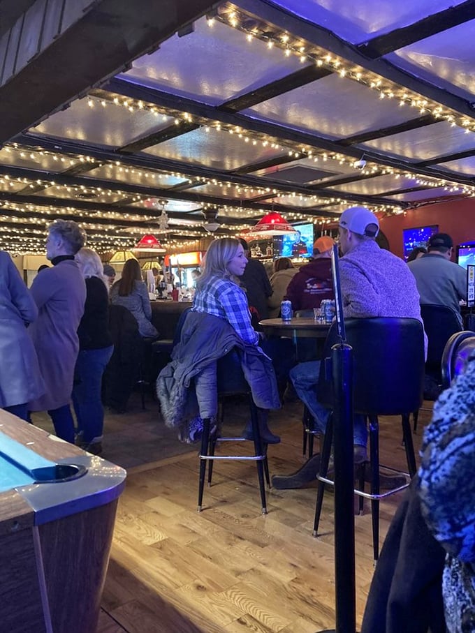Where locals gather under twinkling lights to escape the ordinary. The buzz of conversation is as warming as the comfort food being served.