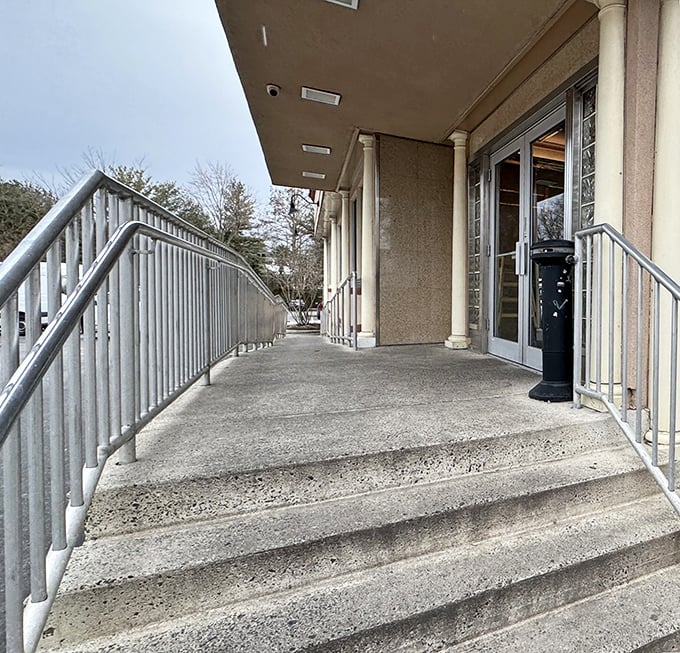 The concrete steps leading to culinary contentment—worn smooth by decades of hungry patrons making their pilgrimage to comfort food paradise.