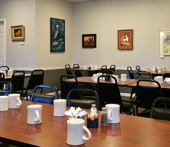 Simple tables, white mugs, and artwork that celebrates nature—RJ's dining room invites you to slow down and savor the moment.
