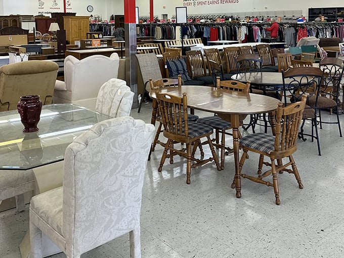 The furniture section resembles a time-traveling dinner party where mid-century chairs mingle with 90s tables in perfect secondhand harmony.