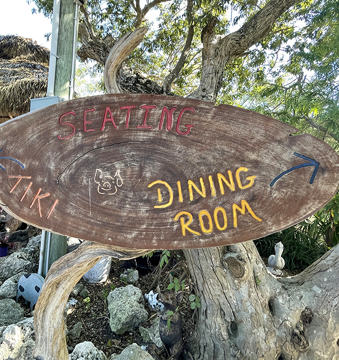 This rustic wooden sign points the way to happiness – follow its directions and your stomach will thank you profusely.