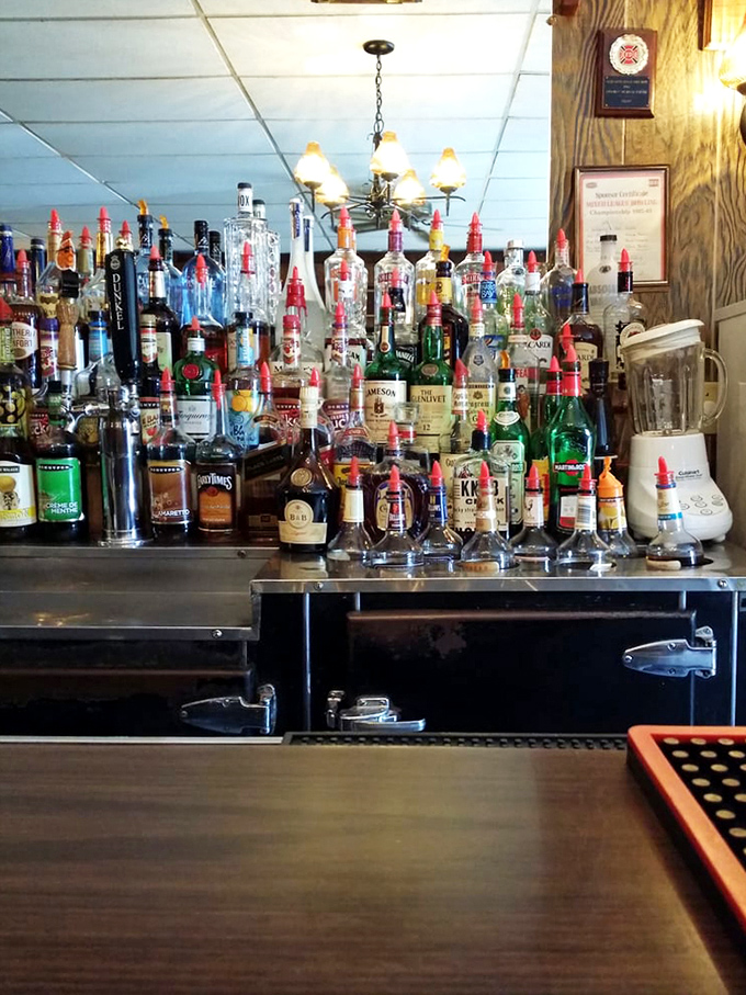 The bar doesn't need mixologists with waxed mustaches – just honest pours and enough options to complement that legendary chicken.