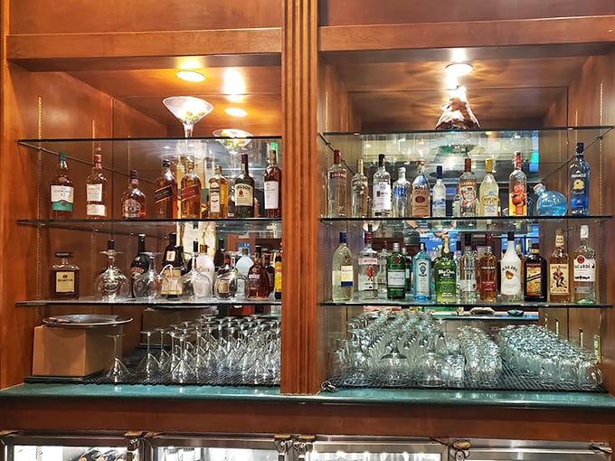Behind glass doors waits a carefully curated collection of spirits—liquid companions to the culinary journey that awaits your taste buds.