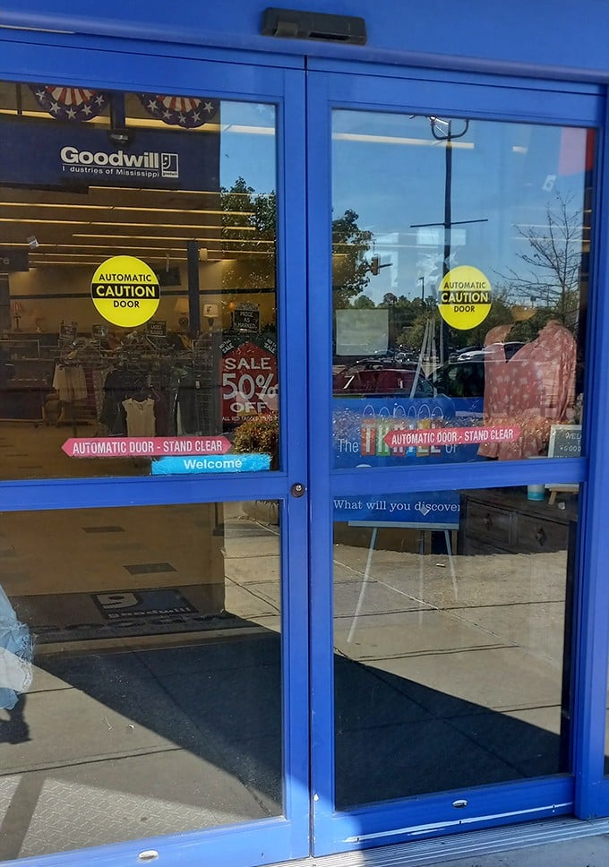 The entrance doors with their cheerful "Welcome" message. The "What will you discover?" question isn't just marketing—it's a legitimate promise.