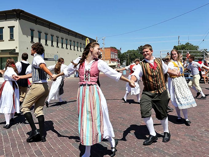 When Lindsborg celebrates its heritage, even the dancing feels authentic—traditional Swedish folk costumes twirling on Kansas brick streets.