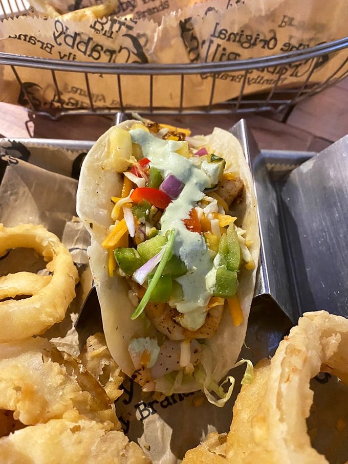 This fish taco isn't just food, it's edible architecture – layers of flavor stacked so perfectly you almost don't want to dismantle it. Almost.