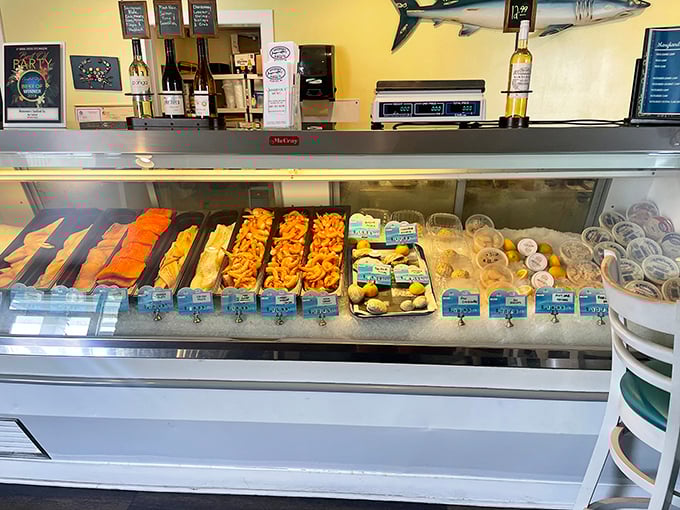 Fresh seafood on ice—nature's bounty awaiting transformation. This display case isn't just refrigeration—it's a window into the ocean's generosity.