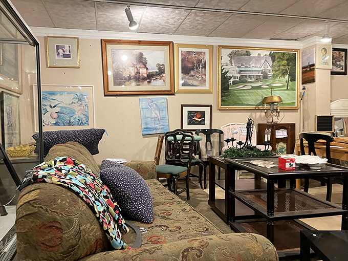 A furniture vignette where that worn sofa has probably heard more stories than most bartenders—and costs less than dinner for two.
