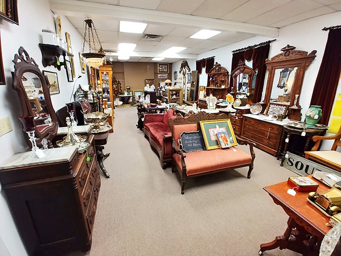 Elegant furnishings arranged like a Victorian parlor waiting for its next soirée. That chaise lounge has "dramatic reading spot" written all over it.