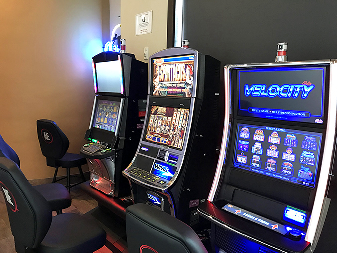 Because sometimes you need to try your luck at the slots after conquering "The Home Run" burger—Fat Ricky's keeps the entertainment coming.