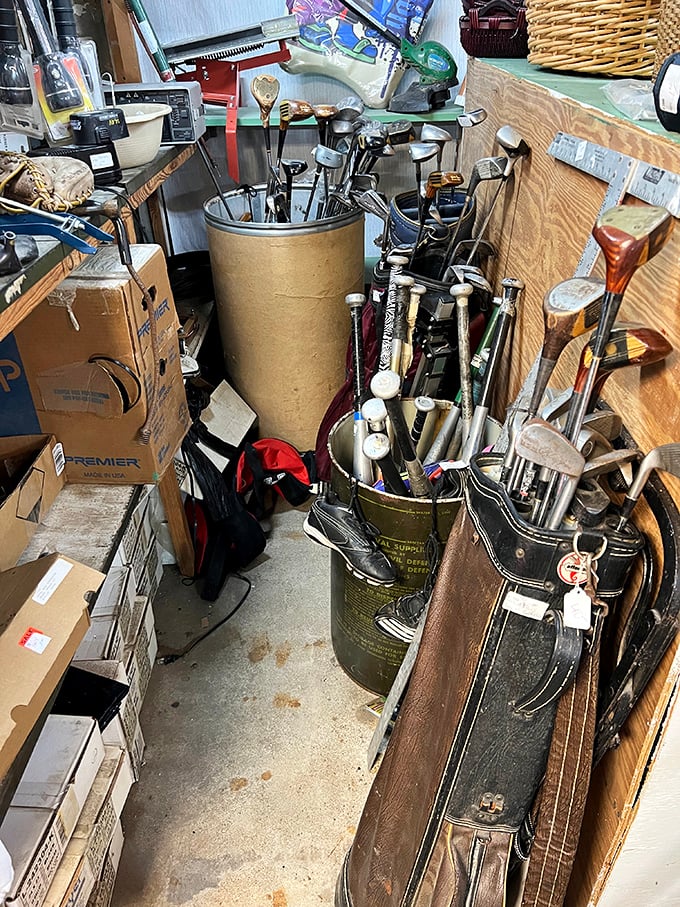 Golf clubs from every era stand at attention. That perfect vintage putter might just contain all the skill your game has been missing.
