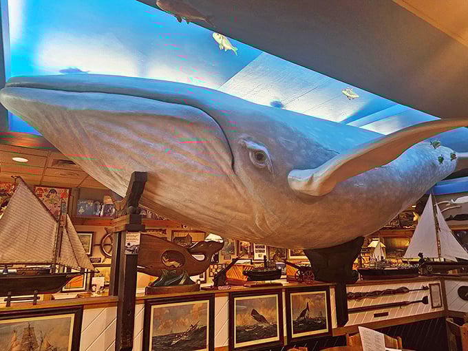 A massive whale sculpture watches over diners, as if to remind you where your dinner once swam.