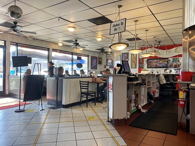 The diner's interior balances nostalgia with necessity. Nothing fancy, just an honest space where the food does the talking and regulars feel at home.