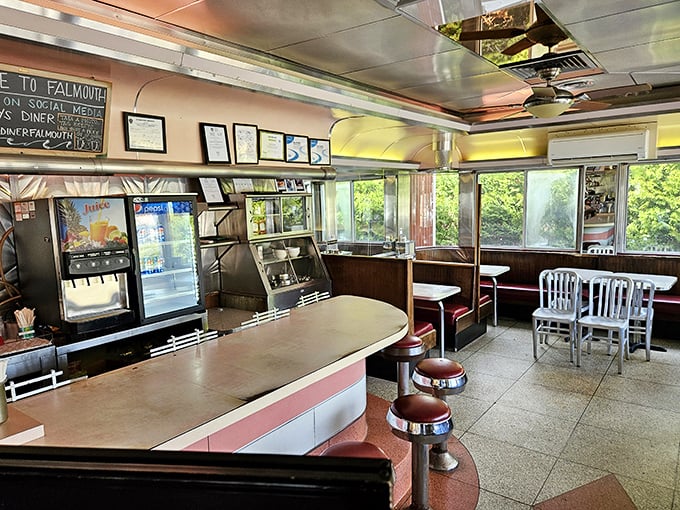 Sunlight streams through windows illuminating a temple of comfort food. This isn't just eating—it's participating in an American tradition.