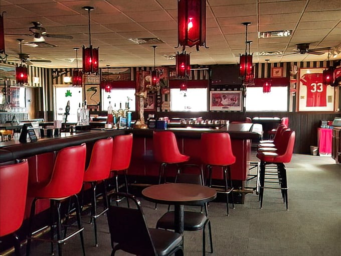 Those red bar stools aren't just seating—they're front-row tickets to the best show in town: Wisconsin's brandy old fashioned theater.