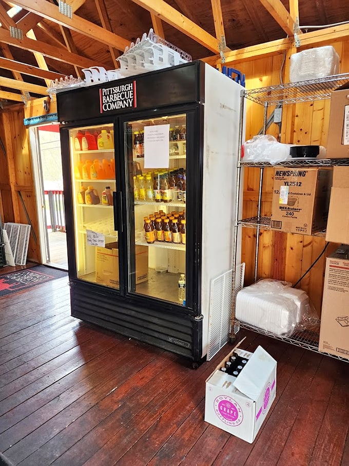 Behind the scenes where the magic happens—even the refrigerator proudly bears the Pittsburgh Barbecue Company name.