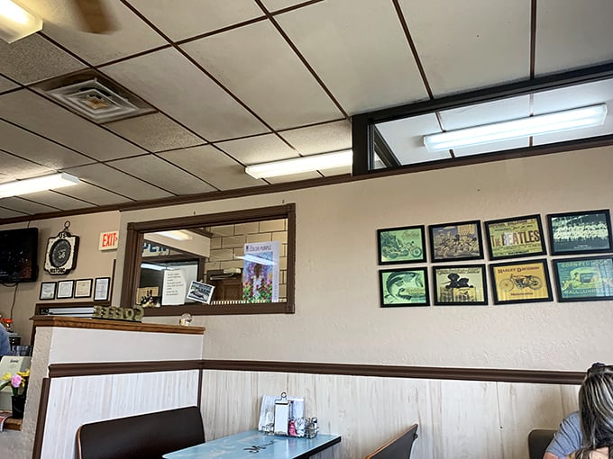 Simple décor with American flag pride. No reclaimed wood or exposed ductwork – just clean, welcoming space for serious eating.