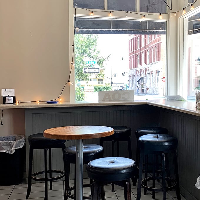 String lights and bar seating by the window—the perfect spot to contemplate life's big questions over something wrapped in pastry.