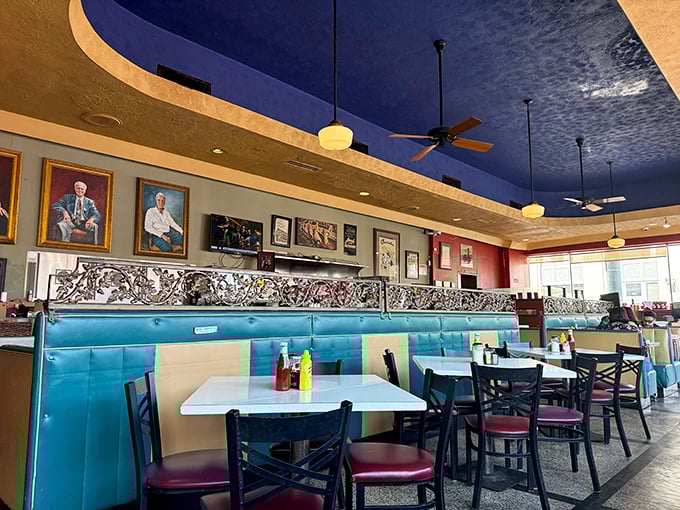 The blue ceiling and retro booths create a dining atmosphere that's both nostalgic and timeless, like finding your grandmother's recipe box filled with secrets to happiness.
