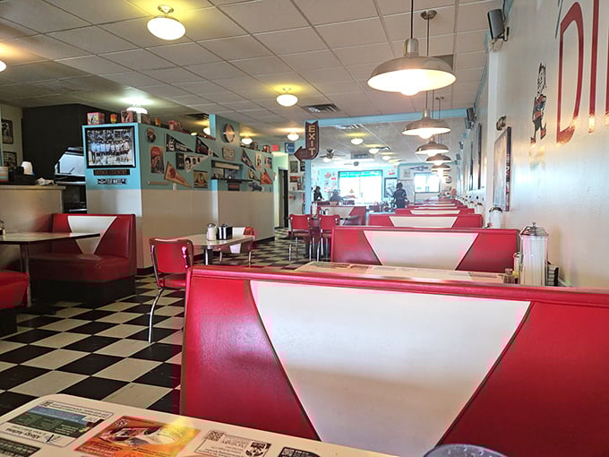 Red and white booths invite you to slide in and stay awhile in this temple of comfort food and conversation.