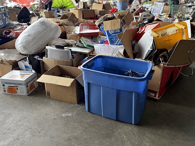 Behind the scenes, donation piles await sorting—each cardboard box a mystery gift to the community from anonymous givers.