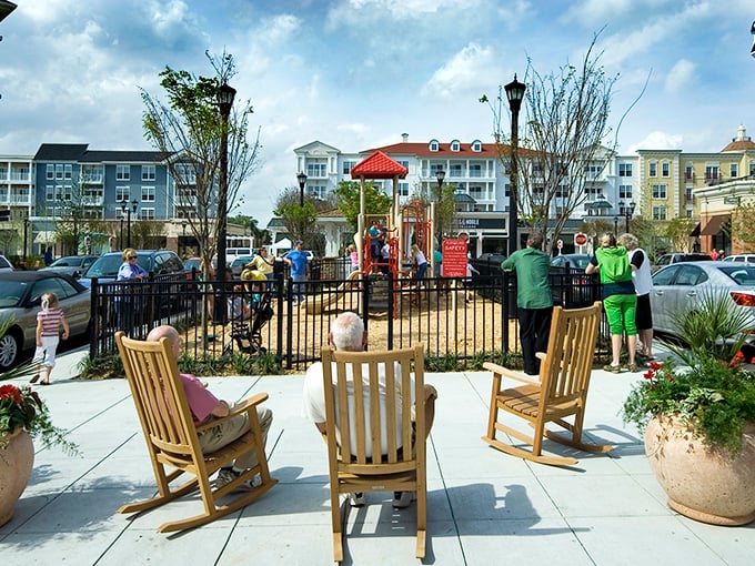 A playground where kids burn energy while adults contemplate the genius of whoever decided shopping centers needed play areas.