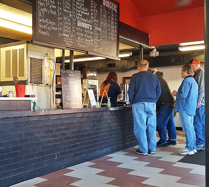 The line forms for a reason. These folks know that good things come to those who wait—especially when those good things are hand-patted burgers.