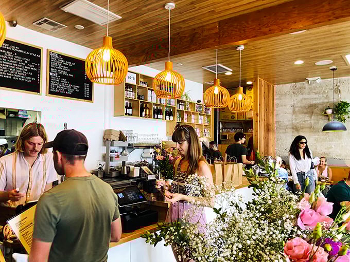 Ordering at Pine & Crane feels like joining a delicious club. Fresh flowers brighten the counter where life-changing food decisions are made daily.