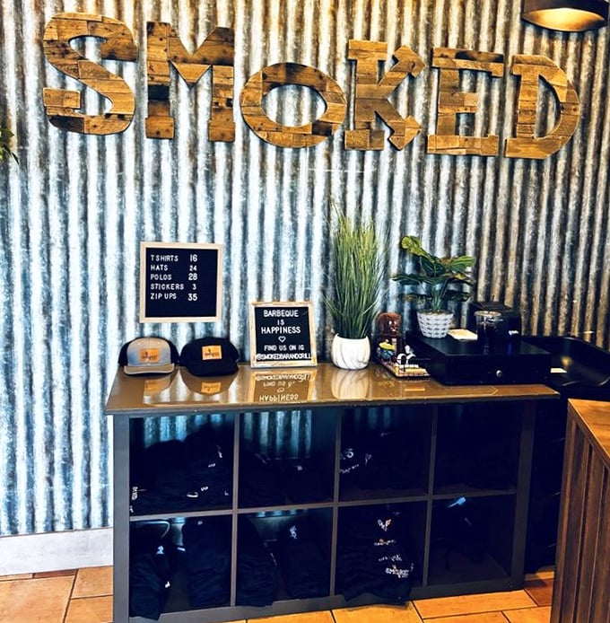 Even the merchandise corner embraces the rustic-industrial vibe – because nothing says "I've found barbecue nirvana" like a branded t-shirt.