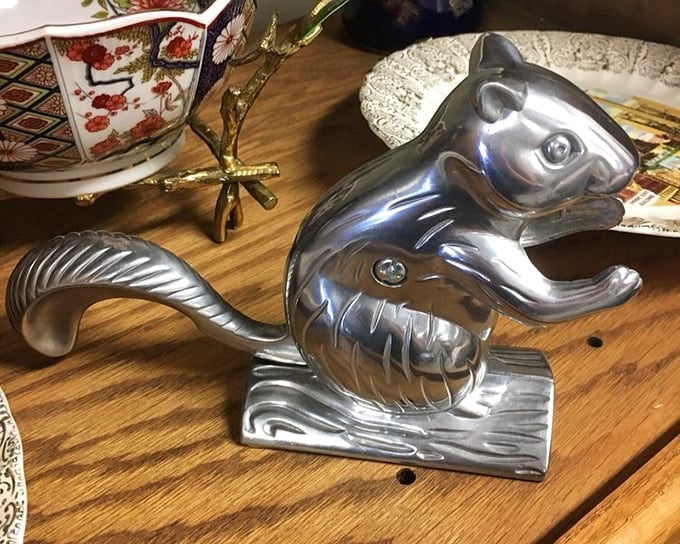 This silver squirrel nutcracker isn't just kitchen decor—it's conversation-starting sculpture that happens to be useful during the holidays.