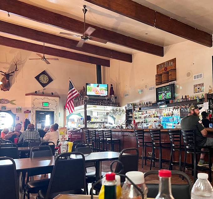 The dining room balances that perfect small-town trifecta: TVs for the game, space for conversation, and enough local character to remind you you're somewhere special.