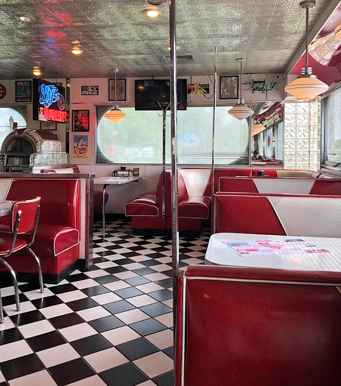Another angle reveals more red vinyl paradise. The diner's interior design philosophy: if it ain't broke (and it's from the '50s), don't fix it.