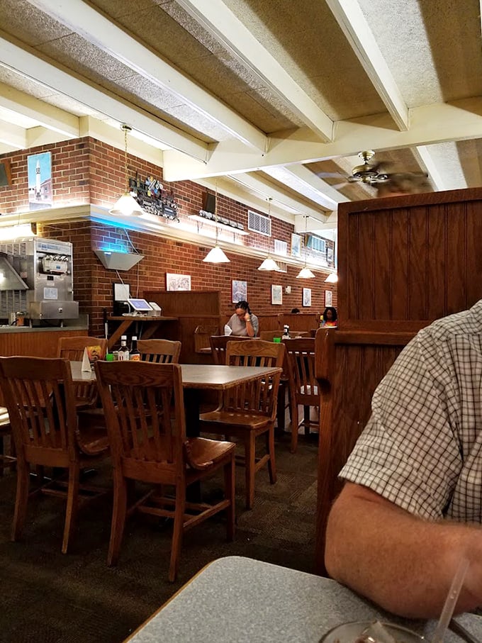 Exposed beams and brick walls create the perfect backdrop for serious eating. No distracting décor—just an environment built for focusing on your food.