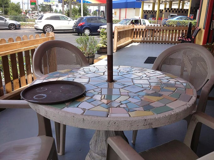 Outdoor seating with mosaic charm—where Florida's sunshine becomes an unofficial ingredient in every meal.