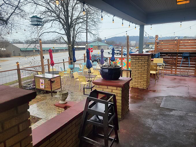 The outdoor patio in winter has a certain poetry to it—string lights waiting for warmer evenings and colorful chairs promising spring's return.