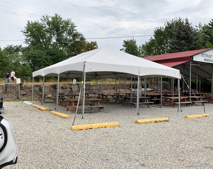 Outdoor seating under a tent—because sometimes you need fresh air to fully appreciate the simple perfection of comfort food.