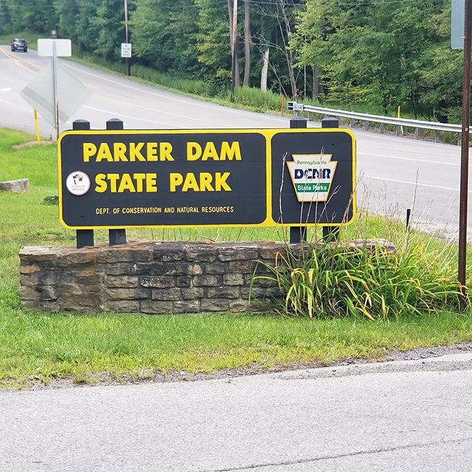 The entrance sign promises adventure—Parker Dam's stone foundation has been welcoming nature lovers since before "selfie spots" were a thing.