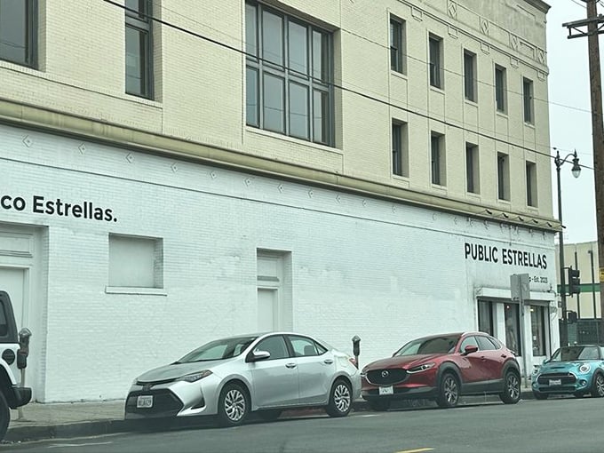 From the street, you'd never guess this unassuming building houses a universe of sartorial possibilities. The best treasures hide in plain sight.