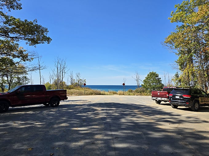 The humble parking lot – where adventures begin and sandy shoes later struggle to find their rightful owners.