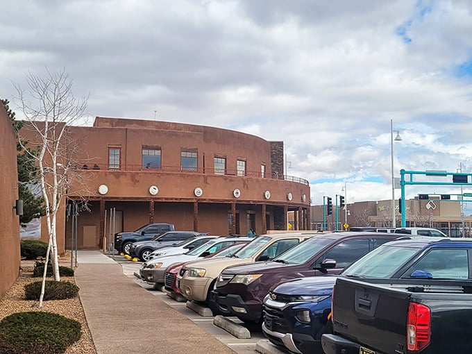 Even the parking lot honors pueblo architecture, with its earth-toned buildings standing against New Mexico's dramatic sky—the prelude to your culinary adventure.