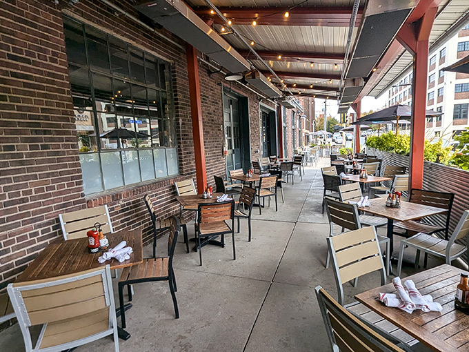 The patio at Smack Shack—where Minnesota's brief but glorious outdoor dining season meets maritime flavors under urban skies.