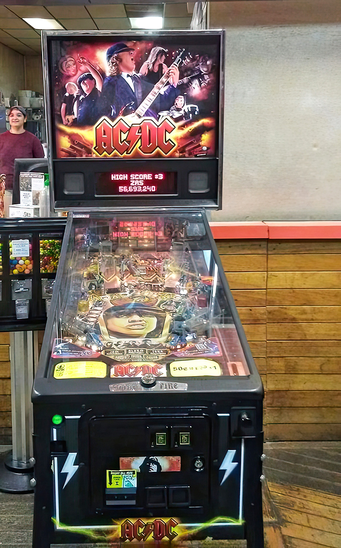 Between bites, challenge yourself to an AC/DC pinball showdown—because nothing aids digestion like the thrill of hitting a high score.