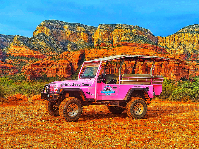The pink jeep doesn't blend in—and that's entirely the point. Like wearing a tuxedo to a beach party, it's confidently out of place.