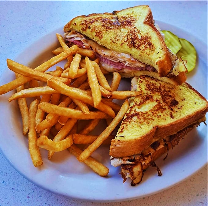 A grilled sandwich that makes you question why lunch doesn't get the same respect as breakfast—crispy, gooey, and utterly perfect.